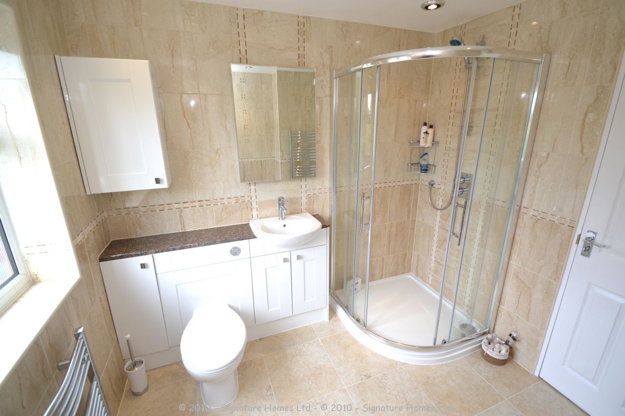 Fitted Bathroom with knock through in Banstead by our bathroom fitters