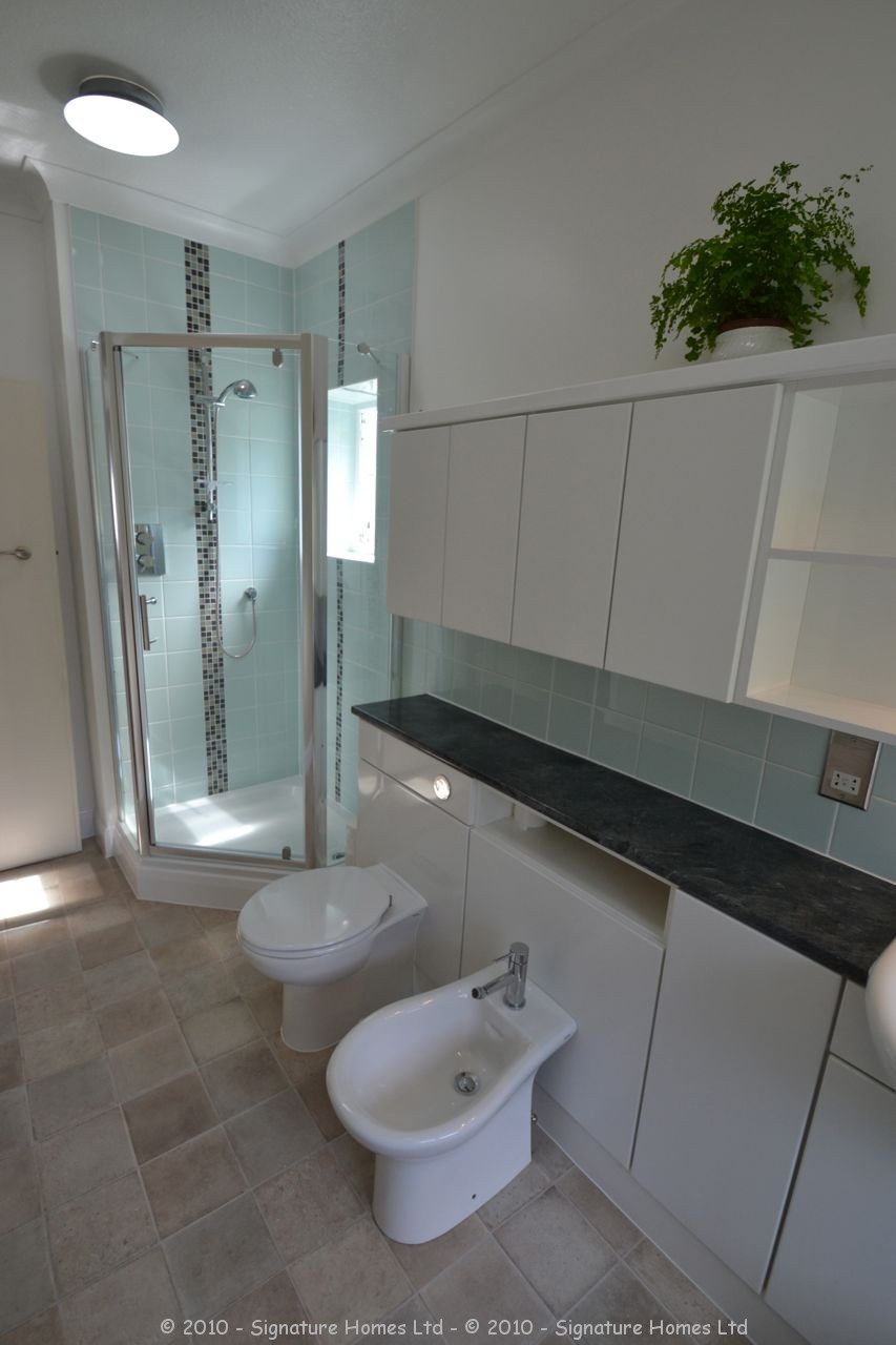 Light & Spacious Fitted Bathroom with pentagon shower enclosure ...