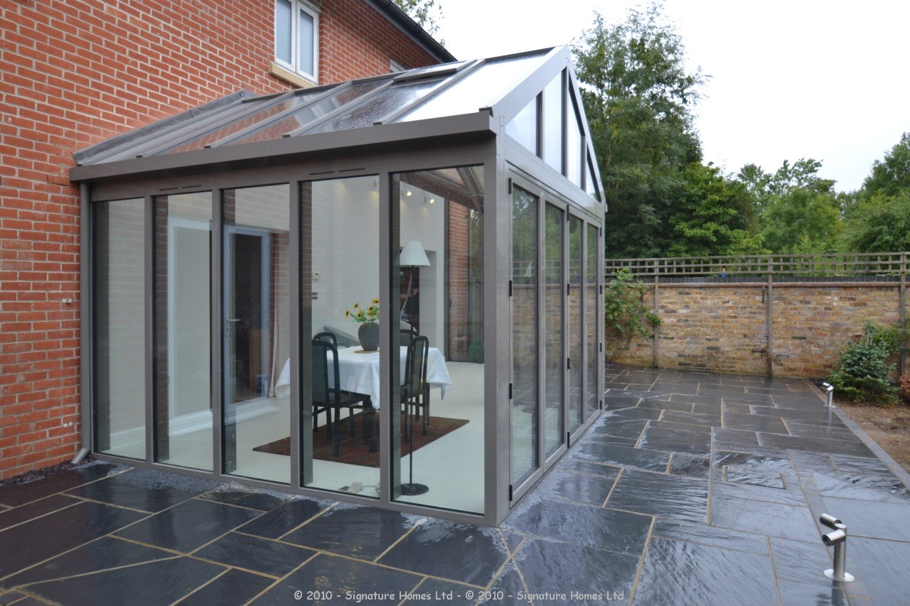 Bespoke Apropos Conservatory with Landscaping - Signature Homes Ltd